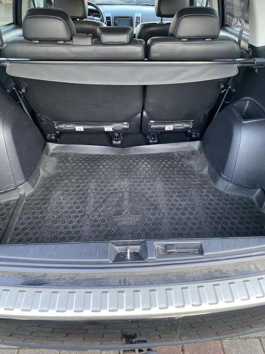 Melns Mitsubishi Outlander 2012 Kauņa, ar dzinēja tilpumu 2.20 L un nobraukumu 179 tūkst. km par 6150 €, foto 14 vietnē AUTOMOTO.COM.LV