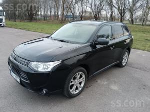 Black Mitsubishi Outlander 2013 in Liepaja, with an engine capacity of 2.20 L and mileage of 165 thousand km for 5650 €, photo 2 on AUTOMOTO.COM.LV