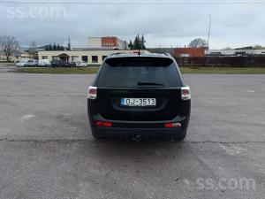 Black Mitsubishi Outlander 2013 in Liepaja, with an engine capacity of 2.20 L and mileage of 165 thousand km for 5650 €, photo 5 on AUTOMOTO.COM.LV