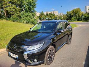 Black Mitsubishi Outlander 2015 in Vilnius, with an engine capacity of 2.00 L and mileage of 178 thousand km for 13550 €, photo  on AUTOMOTO.COM.LV