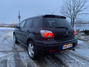 Melns Mitsubishi Outlander 2005 Pērnava, ar dzinēja tilpumu 2.00 L un nobraukumu 330 tūkst. km par 3500 €, foto 2 vietnē AUTOMOTO.COM.LV