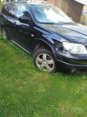 Melns Mitsubishi Outlander 2006 Rīga, ar dzinēja tilpumu 2.30 L un nobraukumu 167 tūkst. km par 1900 €, foto 3 vietnē AUTOMOTO.COM.LV
