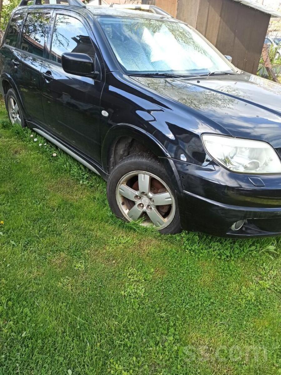 Melns Mitsubishi Outlander 2006 Rīga, ar dzinēja tilpumu 2.30 L un nobraukumu 167 tūkst. km par 1900 €, foto 3 vietnē AUTOMOTO.COM.LV