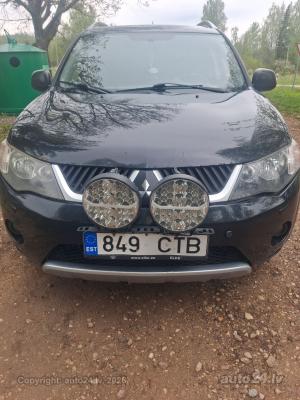 Black Mitsubishi Outlander 2007 in Tallinn, with an engine capacity of 2.00 L and mileage of 401 thousand km for 3999 €, photo  on AUTOMOTO.COM.LV