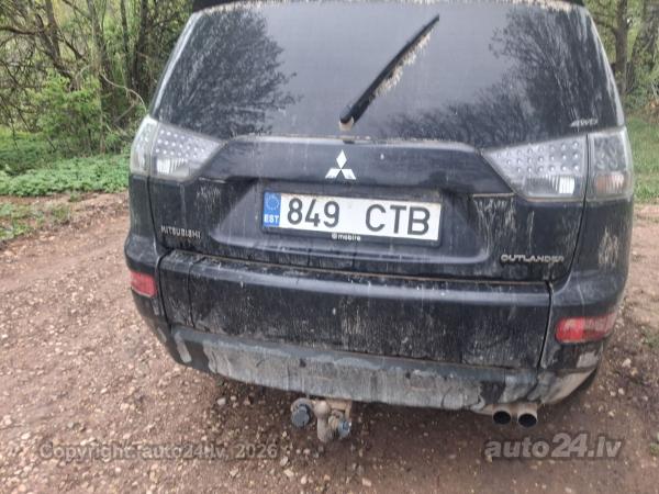 Black Mitsubishi Outlander 2007 in Tallinn, with an engine capacity of 2.00 L and mileage of 401 thousand km for 3999 €, photo 4 on AUTOMOTO.COM.LV