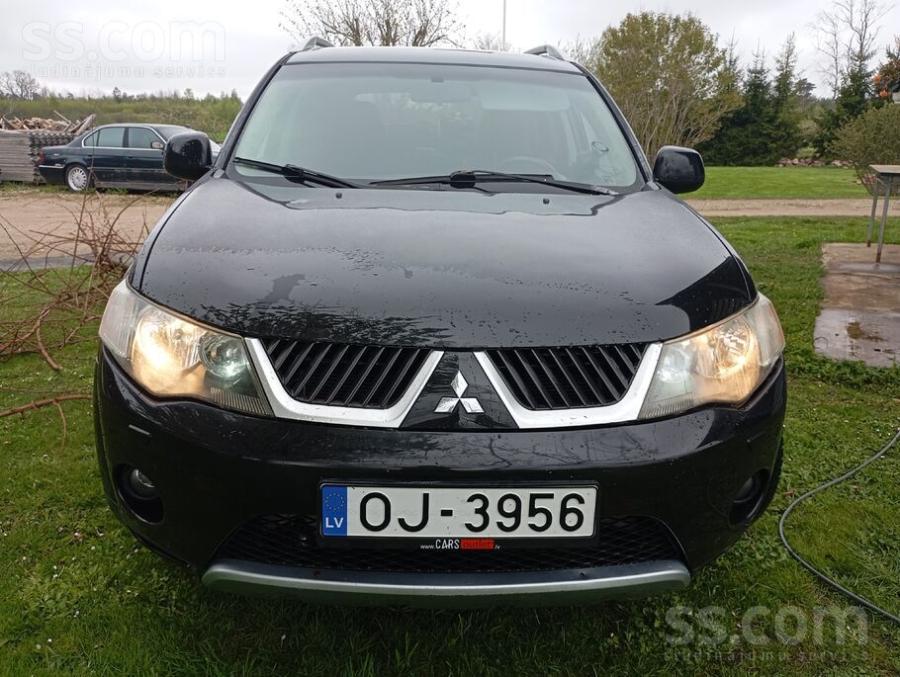 Melns Mitsubishi Outlander 2007 Alūksne, ar dzinēja tilpumu 2.00 L un nobraukumu 383 tūkst. km par 2500 €, foto 1 vietnē AUTOMOTO.COM.LV