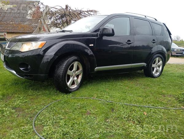 Melns Mitsubishi Outlander 2007 Liepāja, ar dzinēja tilpumu 2.00 L un nobraukumu 383 tūkst. km par 2500 €, foto 2 vietnē AUTOMOTO.COM.LV