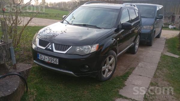 Melns Mitsubishi Outlander 2007 Liepāja, ar dzinēja tilpumu 2.00 L un nobraukumu 383 tūkst. km par 2500 €, foto 4 vietnē AUTOMOTO.COM.LV