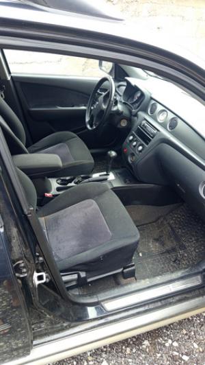Black Mitsubishi Outlander 2007 in Tallinn, with an engine capacity of 0.00 L and mileage of 179 thousand km for 1350 €, photo 9 on AUTOMOTO.COM.LV