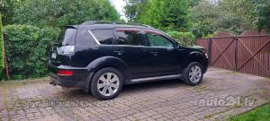 Black Mitsubishi Outlander 2011 in Tallinn, with an engine capacity of 2.40 L and mileage of 260 thousand km for 5790 €, photo 3 on AUTOMOTO.COM.LV