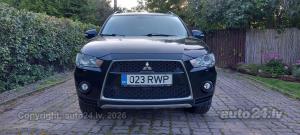 Black Mitsubishi Outlander 2011 in Tallinn, with an engine capacity of 2.40 L and mileage of 260 thousand km for 5790 €, photo 4 on AUTOMOTO.COM.LV