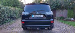 Black Mitsubishi Outlander 2011 in Tallinn, with an engine capacity of 2.40 L and mileage of 260 thousand km for 5790 €, photo 5 on AUTOMOTO.COM.LV