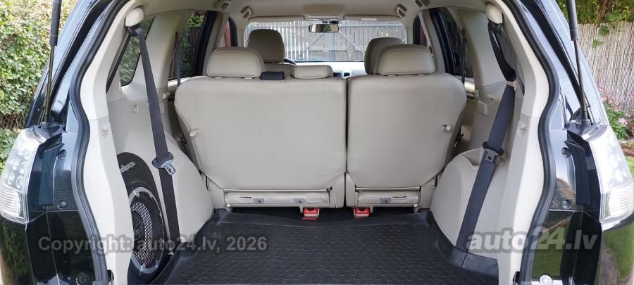 Black Mitsubishi Outlander 2011 in Tallinn, with an engine capacity of 2.40 L and mileage of 260 thousand km for 5790 €, photo 11 on AUTOMOTO.COM.LV