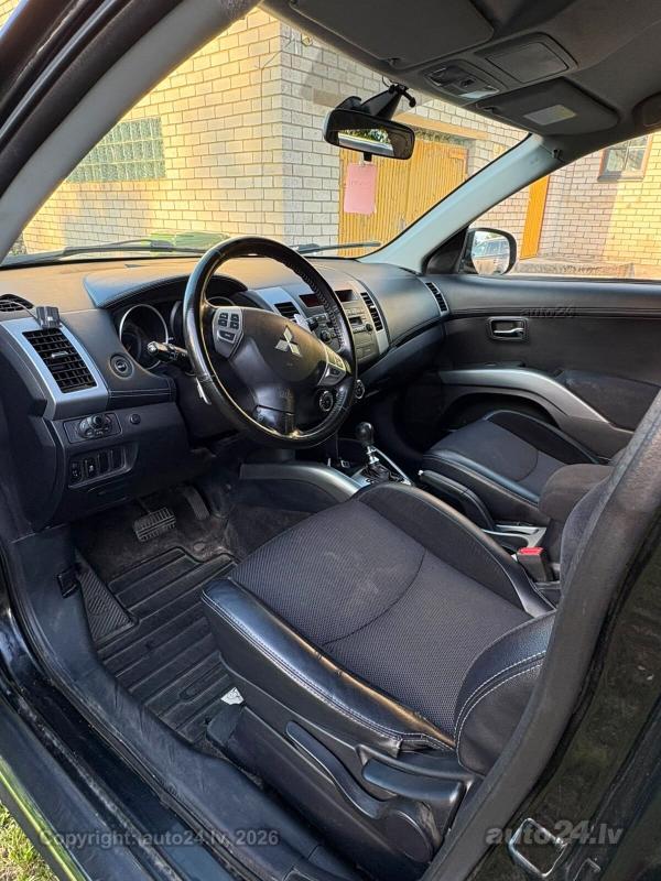 Melns Mitsubishi Outlander 2012 Kuresāre, ar dzinēja tilpumu 2.20 L un nobraukumu 356 tūkst. km par 5650 €, foto 7 vietnē AUTOMOTO.COM.LV