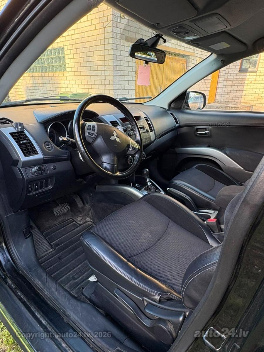 Melns Mitsubishi Outlander 2012 Kuresāre, ar dzinēja tilpumu 2.20 L un nobraukumu 356 tūkst. km par 5650 €, foto 8 vietnē AUTOMOTO.COM.LV