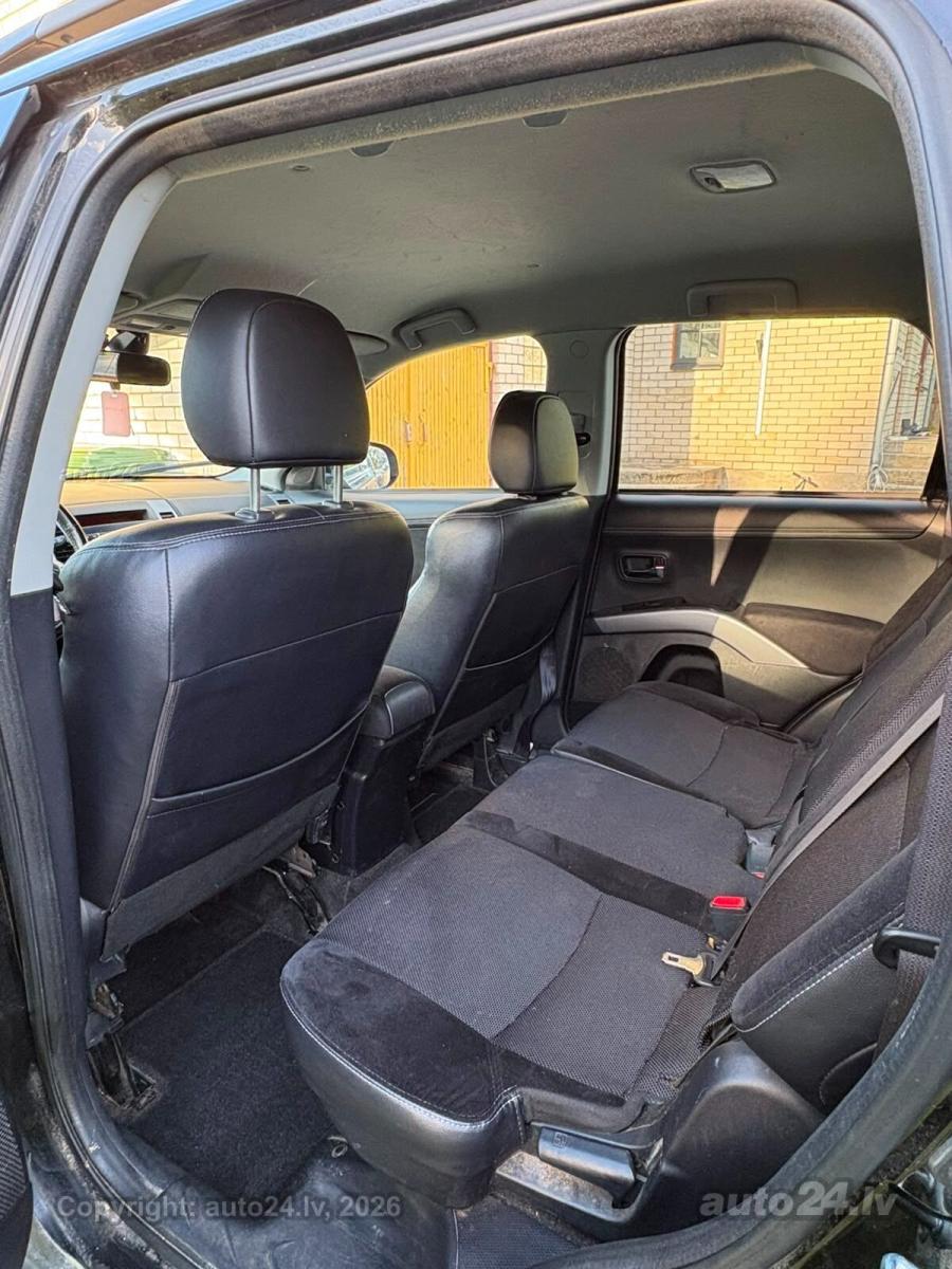 Melns Mitsubishi Outlander 2012 Kuresāre, ar dzinēja tilpumu 2.20 L un nobraukumu 356 tūkst. km par 5650 €, foto 12 vietnē AUTOMOTO.COM.LV