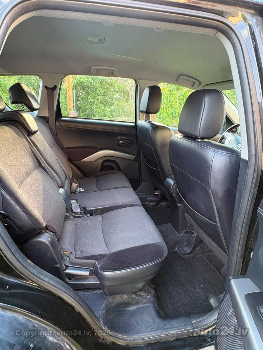 Melns Mitsubishi Outlander 2012 Kuresāre, ar dzinēja tilpumu 2.20 L un nobraukumu 356 tūkst. km par 5650 €, foto 13 vietnē AUTOMOTO.COM.LV