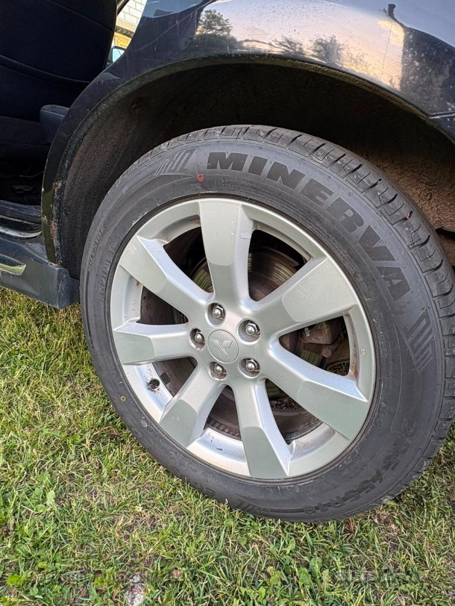 Melns Mitsubishi Outlander 2012 Kuresāre, ar dzinēja tilpumu 2.20 L un nobraukumu 356 tūkst. km par 5650 €, foto 14 vietnē AUTOMOTO.COM.LV