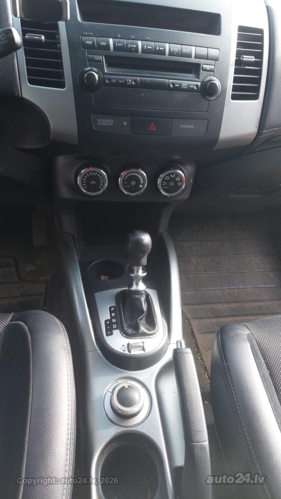 Melns Mitsubishi Outlander 2012 Kuresāre, ar dzinēja tilpumu 2.20 L un nobraukumu 356 tūkst. km par 5650 €, foto 15 vietnē AUTOMOTO.COM.LV