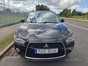 Black Mitsubishi Outlander 2012 in Tallinn, with an engine capacity of 2.40 L and mileage of 208 thousand km for 6900 €, photo 3 on AUTOMOTO.COM.LV