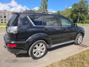 Black Mitsubishi Outlander 2012 in Tallinn, with an engine capacity of 2.40 L and mileage of 208 thousand km for 6900 €, photo 5 on AUTOMOTO.COM.LV