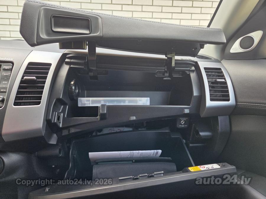 Black Mitsubishi Outlander 2012 in Tallinn, with an engine capacity of 2.40 L and mileage of 208 thousand km for 6900 €, photo 11 on AUTOMOTO.COM.LV