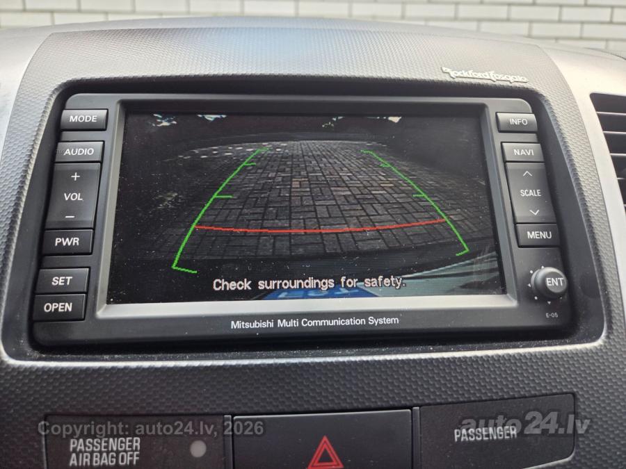 Black Mitsubishi Outlander 2012 in Tallinn, with an engine capacity of 2.40 L and mileage of 208 thousand km for 6900 €, photo 13 on AUTOMOTO.COM.LV