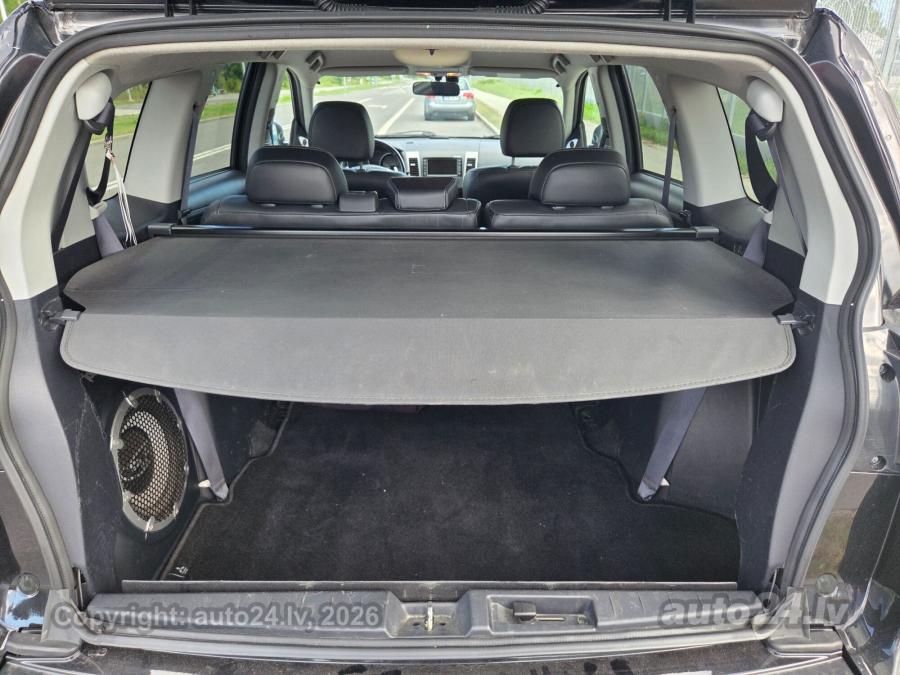 Black Mitsubishi Outlander 2012 in Tallinn, with an engine capacity of 2.40 L and mileage of 208 thousand km for 6900 €, photo 22 on AUTOMOTO.COM.LV