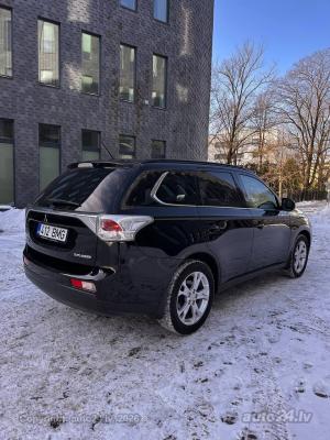 Black Mitsubishi Outlander 2014 in Tallinn, with an engine capacity of 2.00 L and mileage of 96 thousand km for 11500 €, photo 2 on AUTOMOTO.COM.LV