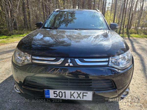 Melns Mitsubishi Outlander 2014 Tallina, ar dzinēja tilpumu 2.00 L un nobraukumu 295 tūkst. km par 7444 €, foto 2 vietnē AUTOMOTO.COM.LV