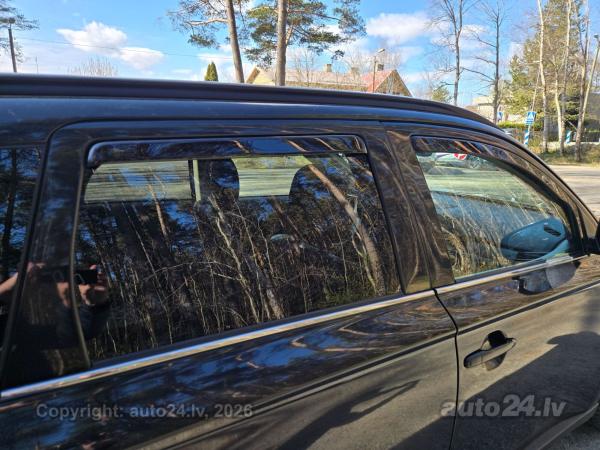 Melns Mitsubishi Outlander 2014 Tallina, ar dzinēja tilpumu 2.00 L un nobraukumu 295 tūkst. km par 7444 €, foto 4 vietnē AUTOMOTO.COM.LV