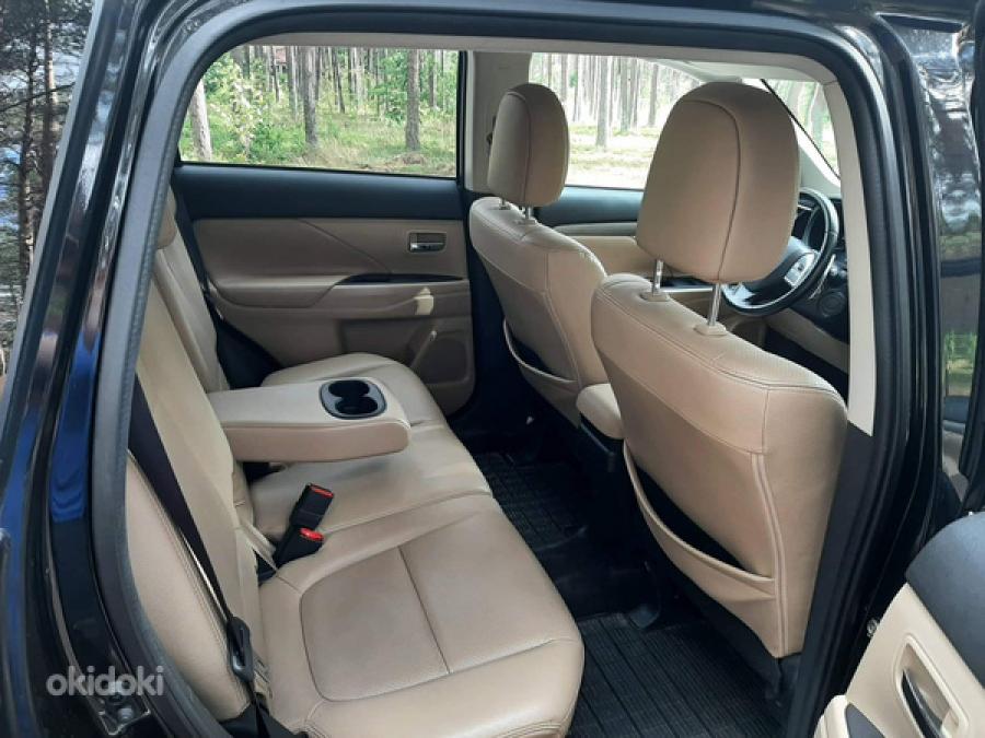 Black Mitsubishi Outlander 2014 in Tallinn, with an engine capacity of 2.00 L and mileage of 230 thousand km for 6500 €, photo 3 on AUTOMOTO.COM.LV