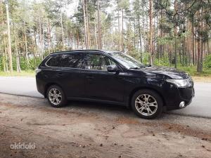 Black Mitsubishi Outlander 2014 in Tallinn, with an engine capacity of 2.00 L and mileage of 230 thousand km for 6500 €, photo 7 on AUTOMOTO.COM.LV