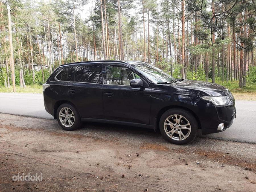 Black Mitsubishi Outlander 2014 in Tallinn, with an engine capacity of 2.00 L and mileage of 230 thousand km for 6500 €, photo 7 on AUTOMOTO.COM.LV