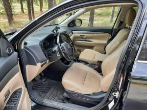 Black Mitsubishi Outlander 2014 in Tallinn, with an engine capacity of 2.00 L and mileage of 230 thousand km for 6500 €, photo 12 on AUTOMOTO.COM.LV