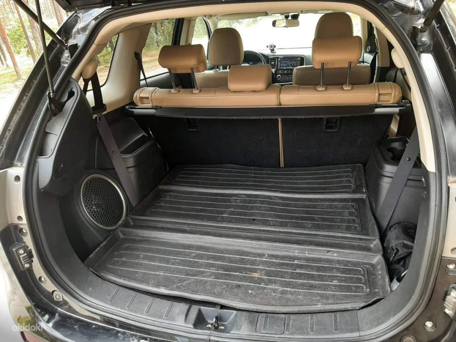 Black Mitsubishi Outlander 2014 in Tallinn, with an engine capacity of 2.00 L and mileage of 230 thousand km for 6500 €, photo 13 on AUTOMOTO.COM.LV