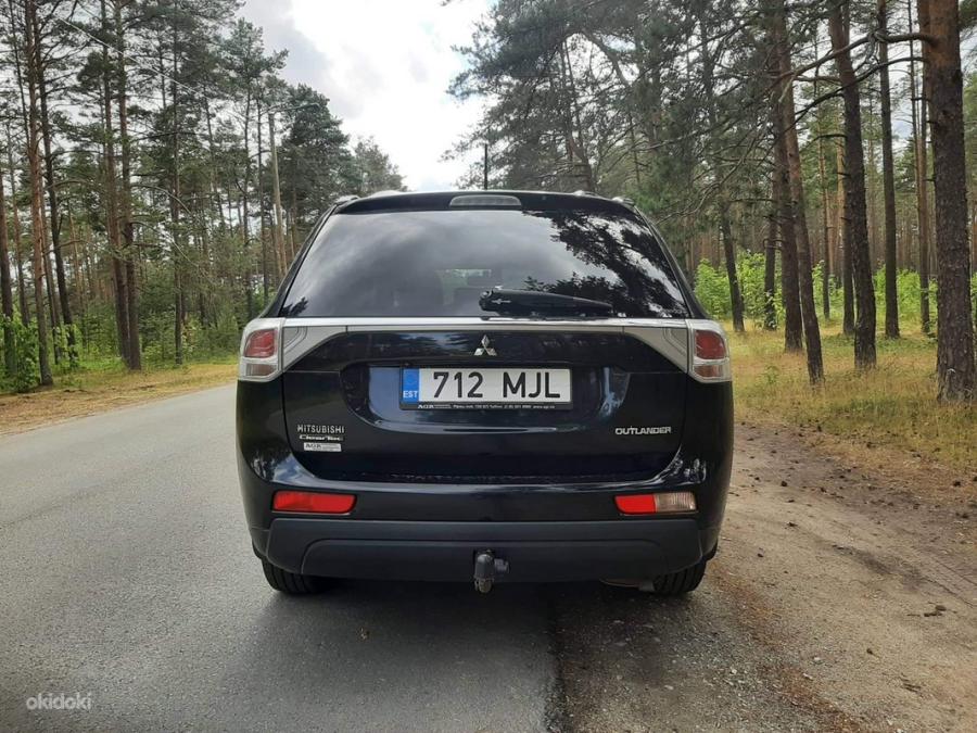 Black Mitsubishi Outlander 2014 in Tallinn, with an engine capacity of 2.00 L and mileage of 230 thousand km for 6500 €, photo 14 on AUTOMOTO.COM.LV