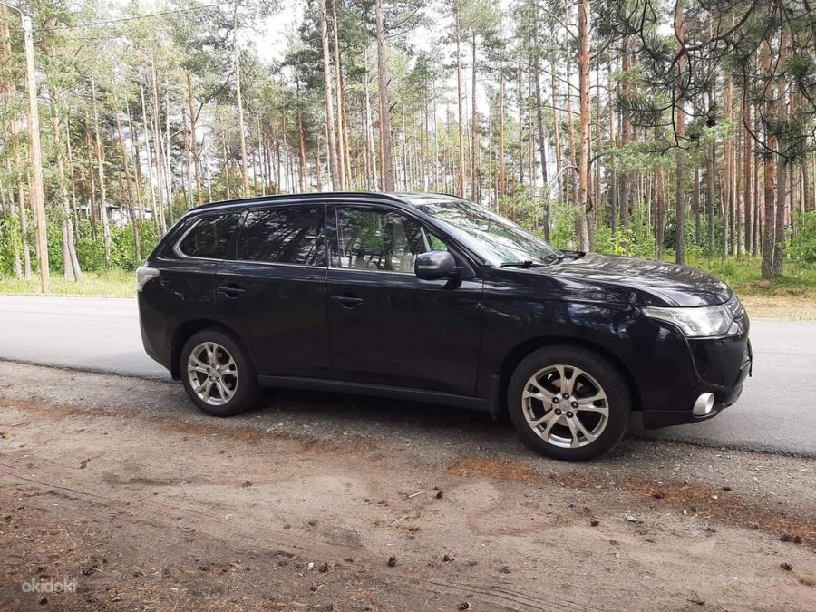 Black Mitsubishi Outlander 2014 in Tallinn, with an engine capacity of 2.00 L and mileage of 230 thousand km for 6500 €, photo 15 on AUTOMOTO.COM.LV