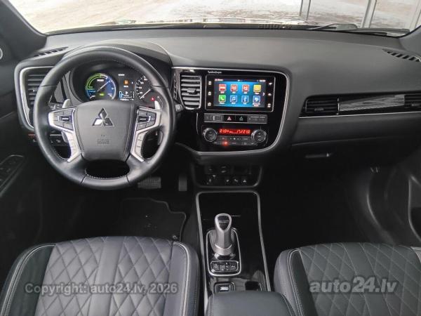 Black Mitsubishi Outlander 2019 in Tallinn, with an engine capacity of 2.40 L and mileage of 59 thousand km for 19990 €, photo 11 on AUTOMOTO.COM.LV