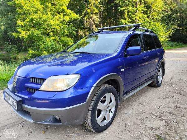 Zils Mitsubishi Outlander 2005 Viļņa, ar dzinēja tilpumu 2.40 L un nobraukumu 257 tūkst. km par 1600 €, foto 1 vietnē AUTOMOTO.COM.LV