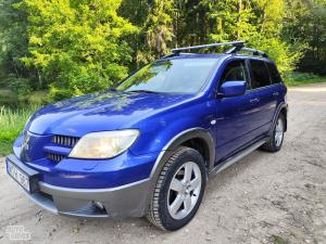 Blue Mitsubishi Outlander 2005 in Vilnius, with an engine capacity of 2.40 L and mileage of 257 thousand km for 1600 €, photo  on AUTOMOTO.COM.LV