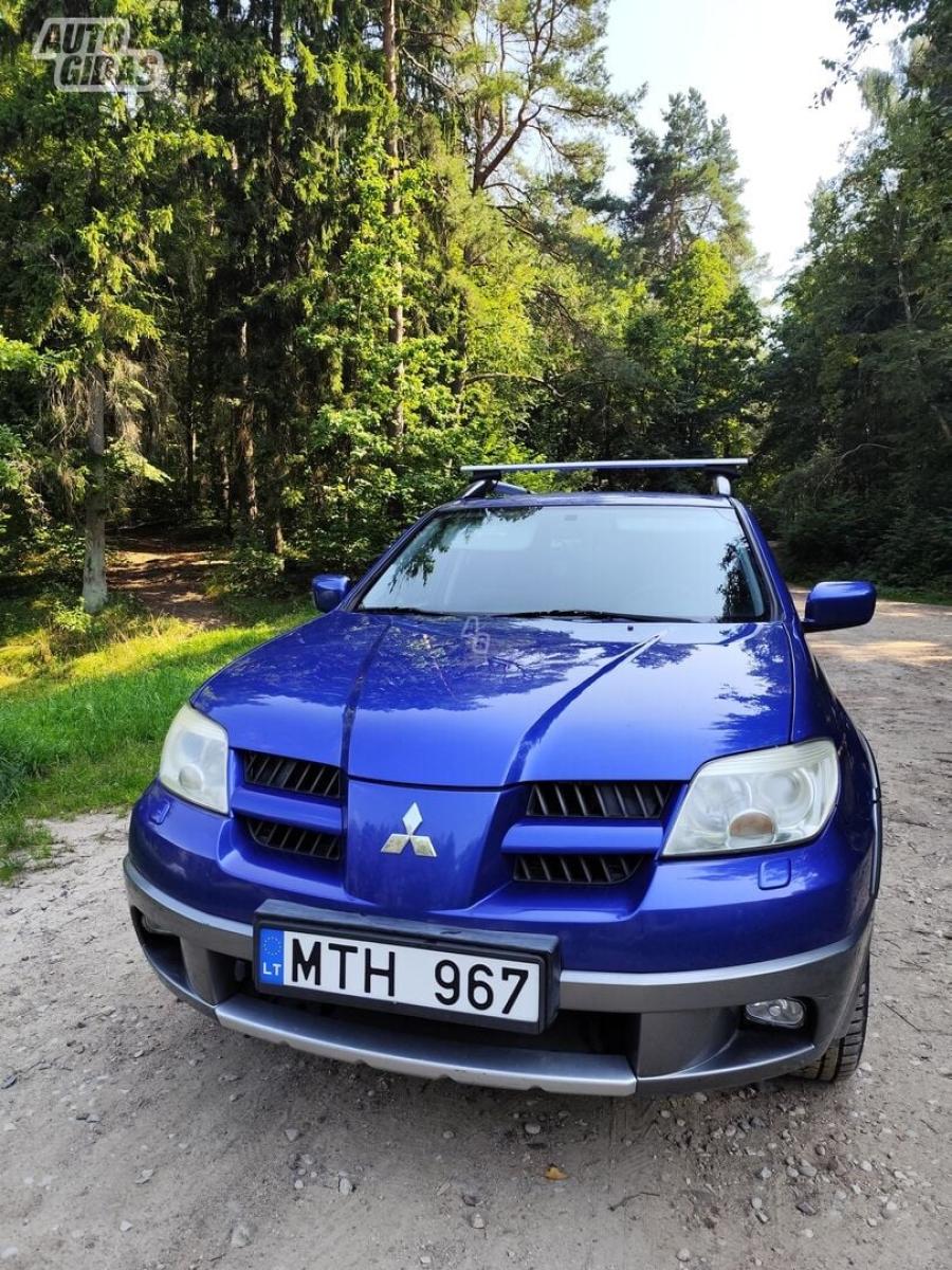 Blue Mitsubishi Outlander 2005 in Vilnius, with an engine capacity of 2.40 L and mileage of 257 thousand km for 1600 €, photo 3 on AUTOMOTO.COM.LV