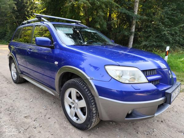 Zils Mitsubishi Outlander 2005 Viļņa, ar dzinēja tilpumu 2.40 L un nobraukumu 257 tūkst. km par 1600 €, foto 3 vietnē AUTOMOTO.COM.LV