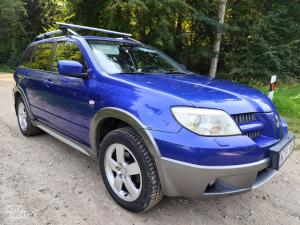 Blue Mitsubishi Outlander 2005 in Vilnius, with an engine capacity of 2.40 L and mileage of 257 thousand km for 1600 €, photo 4 on AUTOMOTO.COM.LV