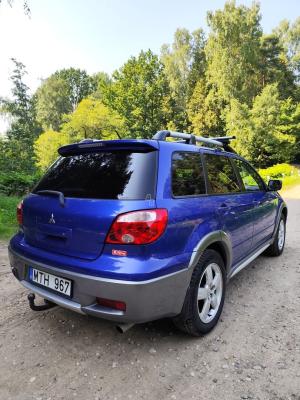 Blue Mitsubishi Outlander 2005 in Vilnius, with an engine capacity of 2.40 L and mileage of 257 thousand km for 1600 €, photo 5 on AUTOMOTO.COM.LV