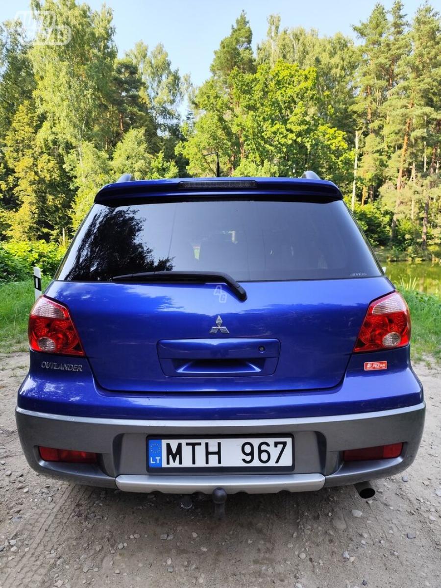 Blue Mitsubishi Outlander 2005 in Vilnius, with an engine capacity of 2.40 L and mileage of 257 thousand km for 1600 €, photo 6 on AUTOMOTO.COM.LV