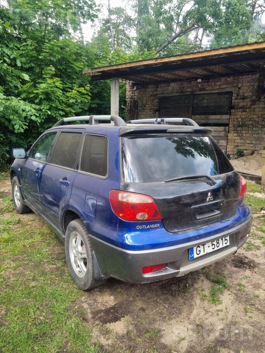 Zils Mitsubishi Outlander 2007 Rīga, ar dzinēja tilpumu 2.20 L un nobraukumu 0 tūkst. km par 3700 €, foto 5 vietnē AUTOMOTO.COM.LV