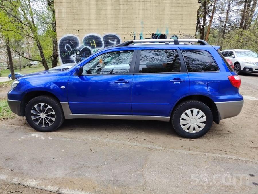 Zils Mitsubishi Outlander 2007 Rīga, ar dzinēja tilpumu 2.00 L un nobraukumu 204 tūkst. km par 2200 €, foto 5 vietnē AUTOMOTO.COM.LV
