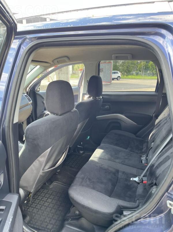Zils Mitsubishi Outlander 2007 Daugavpils, ar dzinēja tilpumu 2.00 L un nobraukumu 393 tūkst. km par 2200 €, foto 9 vietnē AUTOMOTO.COM.LV