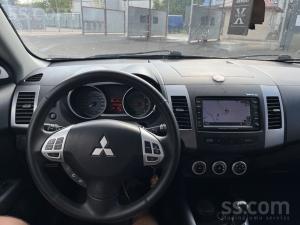 Zils Mitsubishi Outlander 2007 Daugavpils, ar dzinēja tilpumu 2.00 L un nobraukumu 393 tūkst. km par 2200 €, foto 12 vietnē AUTOMOTO.COM.LV